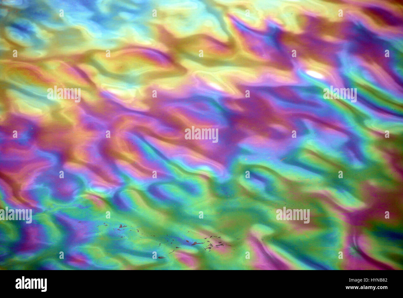 Abstract - patterns of oil on water in Liverpool, England Stock Photo ...
