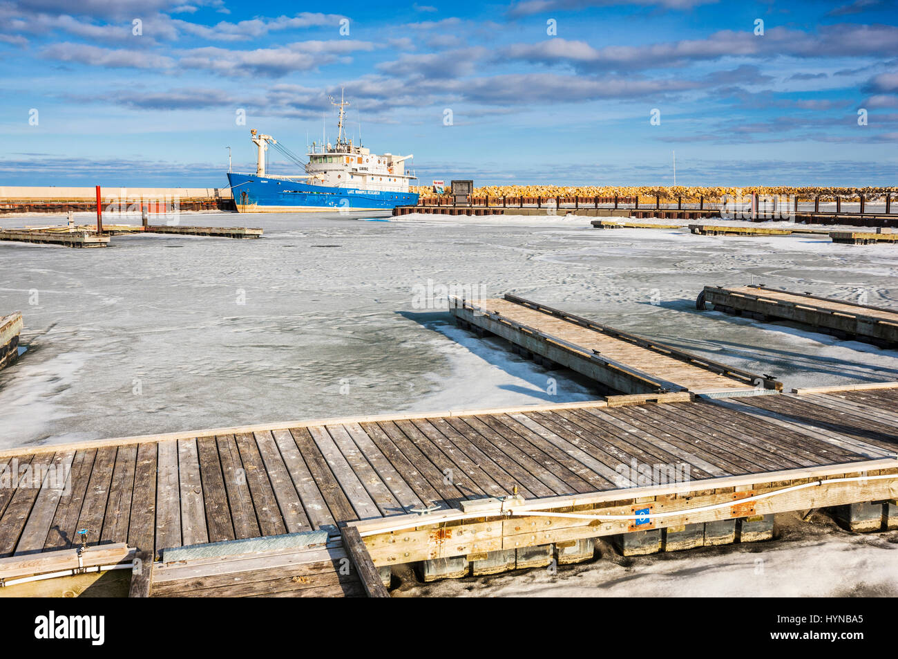 Sunny day in marina on frozen Lake Winnipeg, Gimli, Manitoba, Canada ...