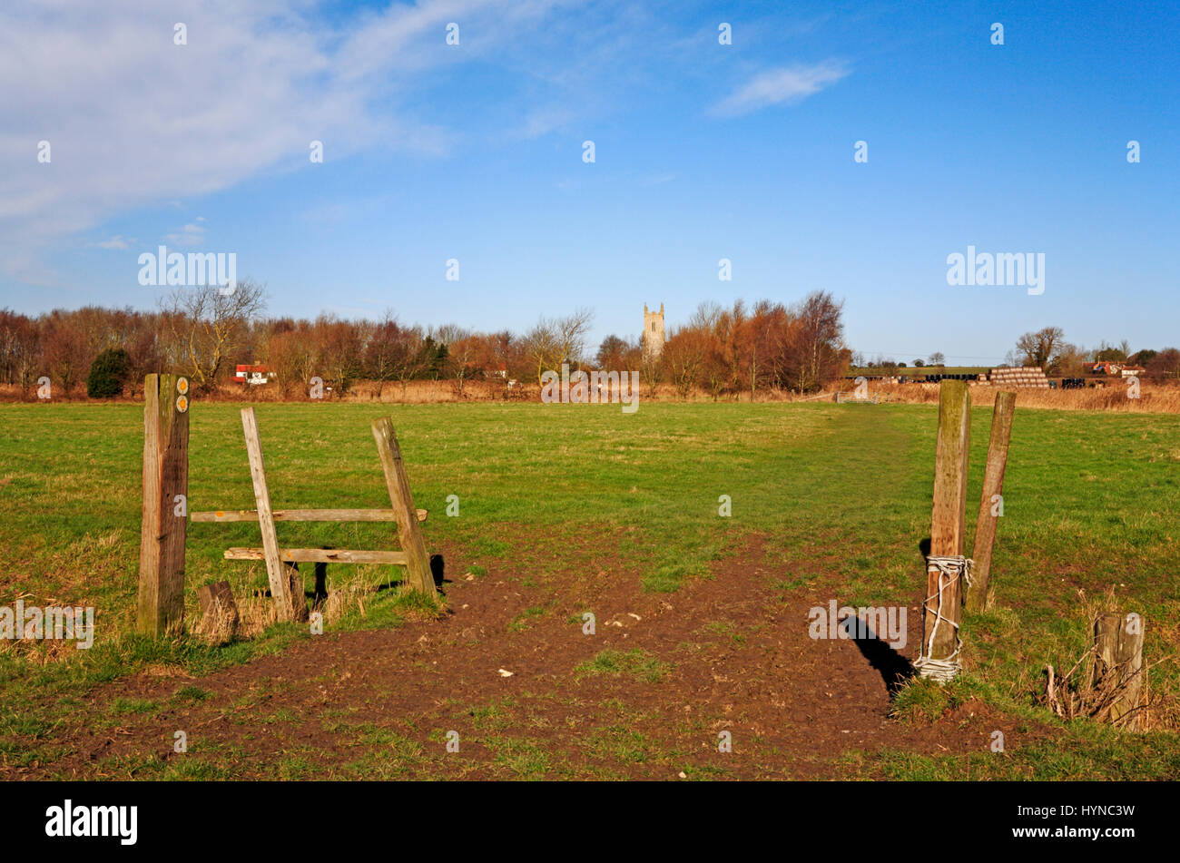 A view of a public footpath over grazing meadows towards the parish ...