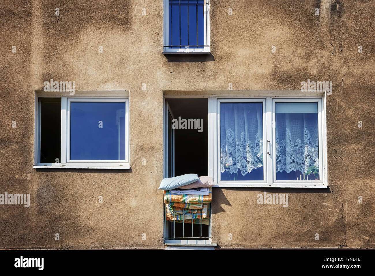 Laundry hanging out of window hi-res stock photography and images - Alamy