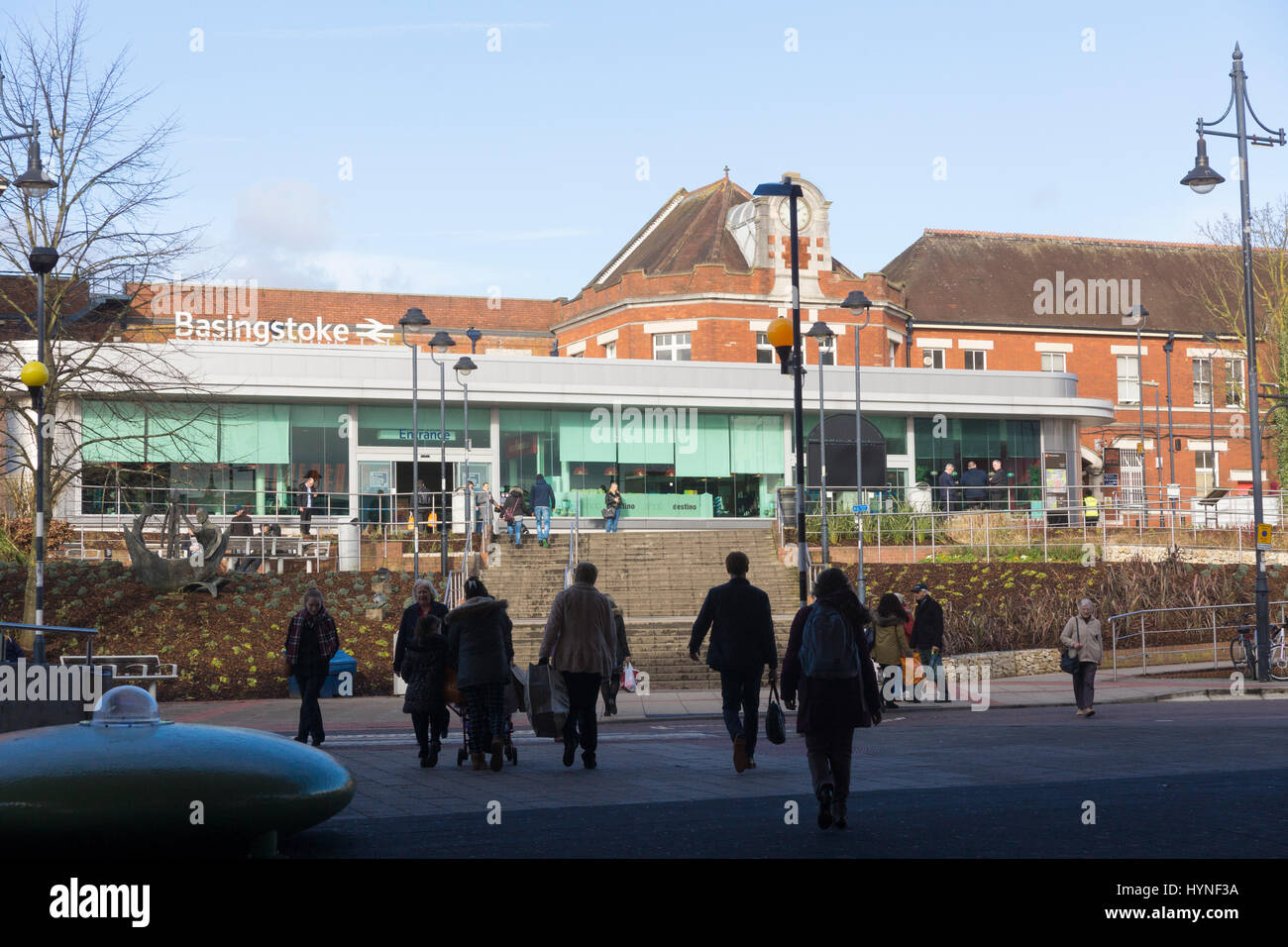 Shoppers heading towards Basingstoke train station, Hampshire Stock ...