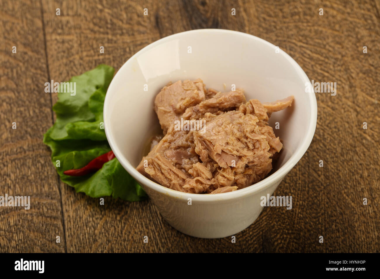 Canned tuna fish in the bowl ready for cooking Stock Photo - Alamy