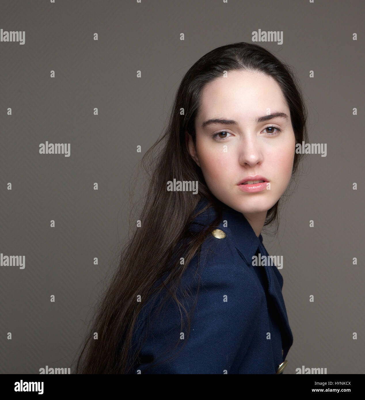 Close up portrait of a beautiful young woman with long hair and clean ...