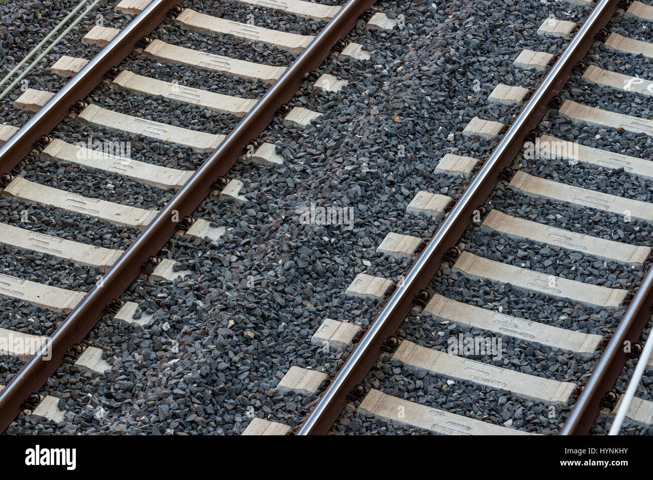 view of a pair of train rails Stock Photo - Alamy