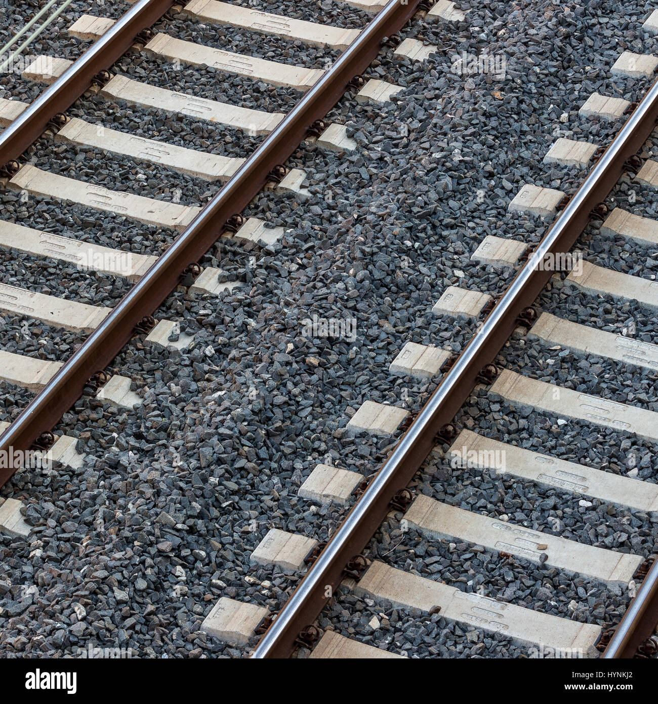 view of a pair of train rails Stock Photo - Alamy