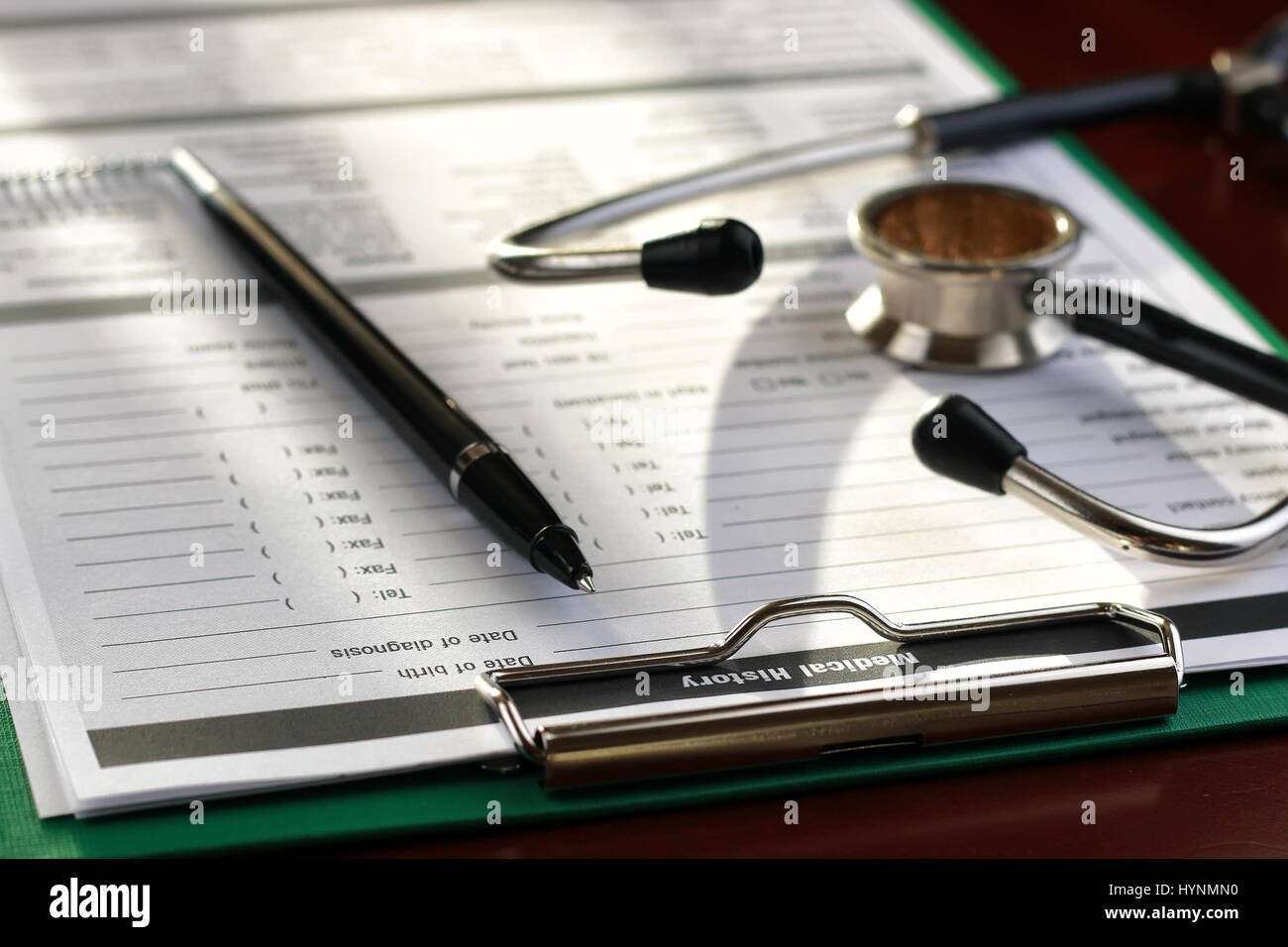 stethoscope medical documents pen Stock Photo - Alamy