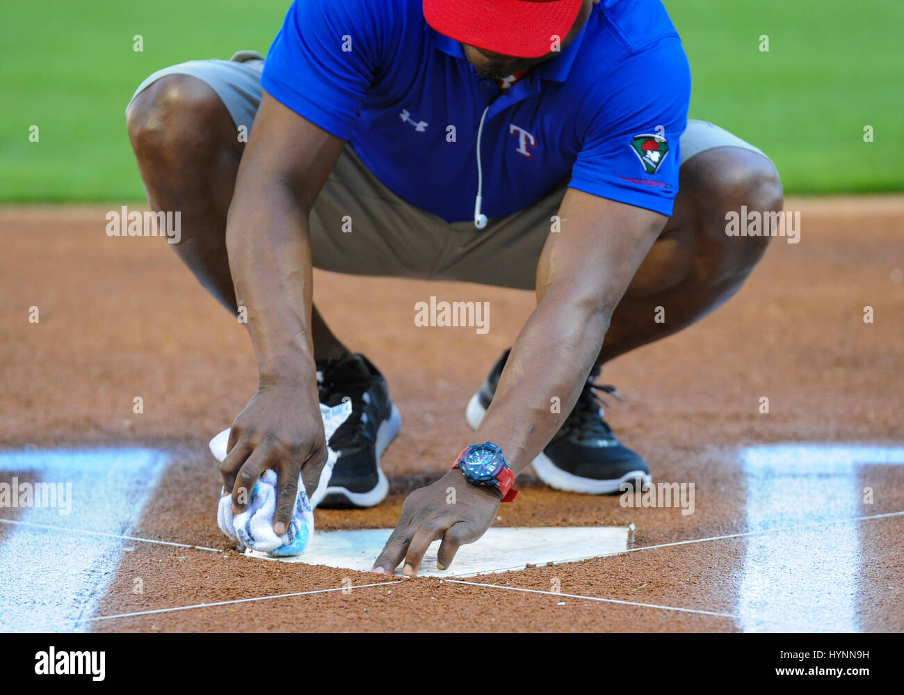 APR 03, 2017: Ground crew prepare home plate before an MLB Opening Day ...