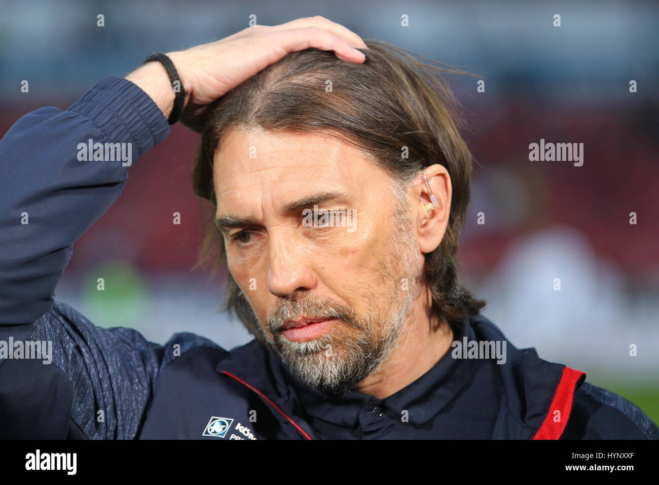 Mainz, Germany. 05th Apr, 2017. Mainz's manager Martin Schmidt rubs his ...