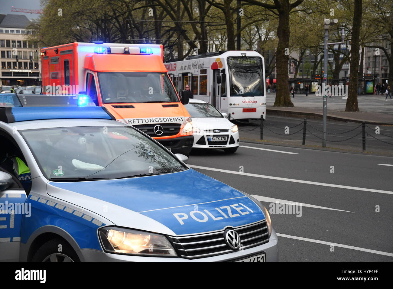 Cologne, Germany. 5th Apr, 2017. An ambulance and a police car ...