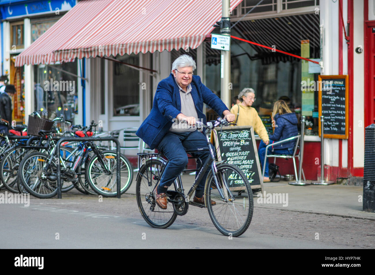 Male man cyclist riding a bike cycle bicycle in Cambridge ...