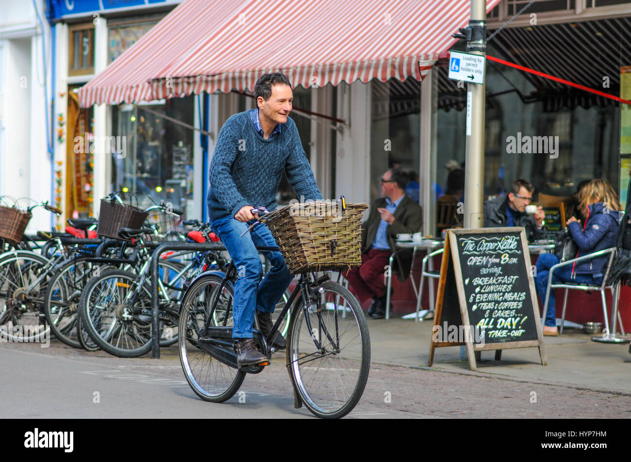 Male man cyclist riding a bike cycle bicycle in Cambridge ...