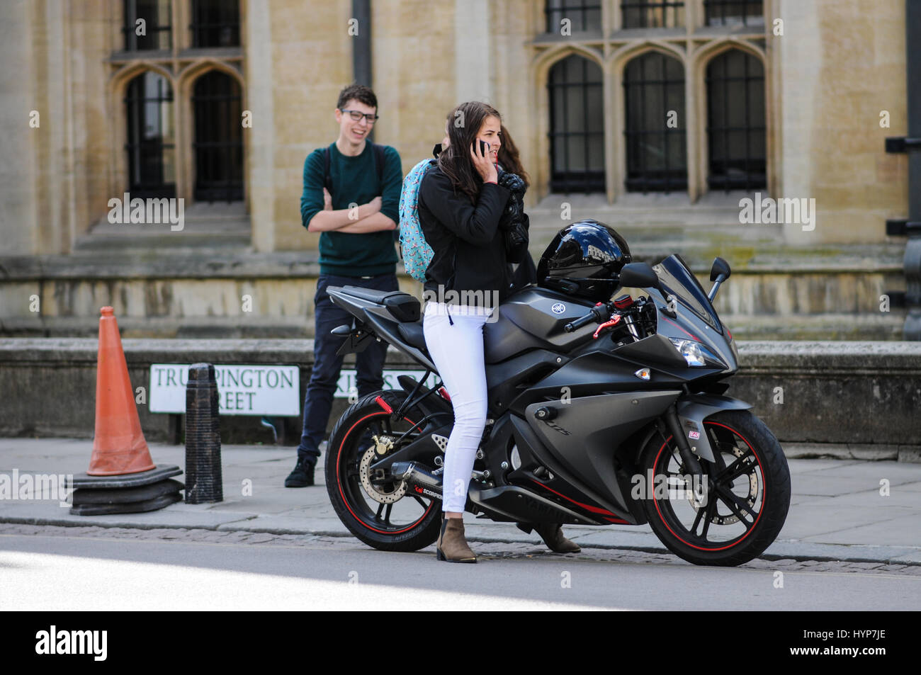 Lady young women riding her motor cycle in Cambridge England UK Stock ...