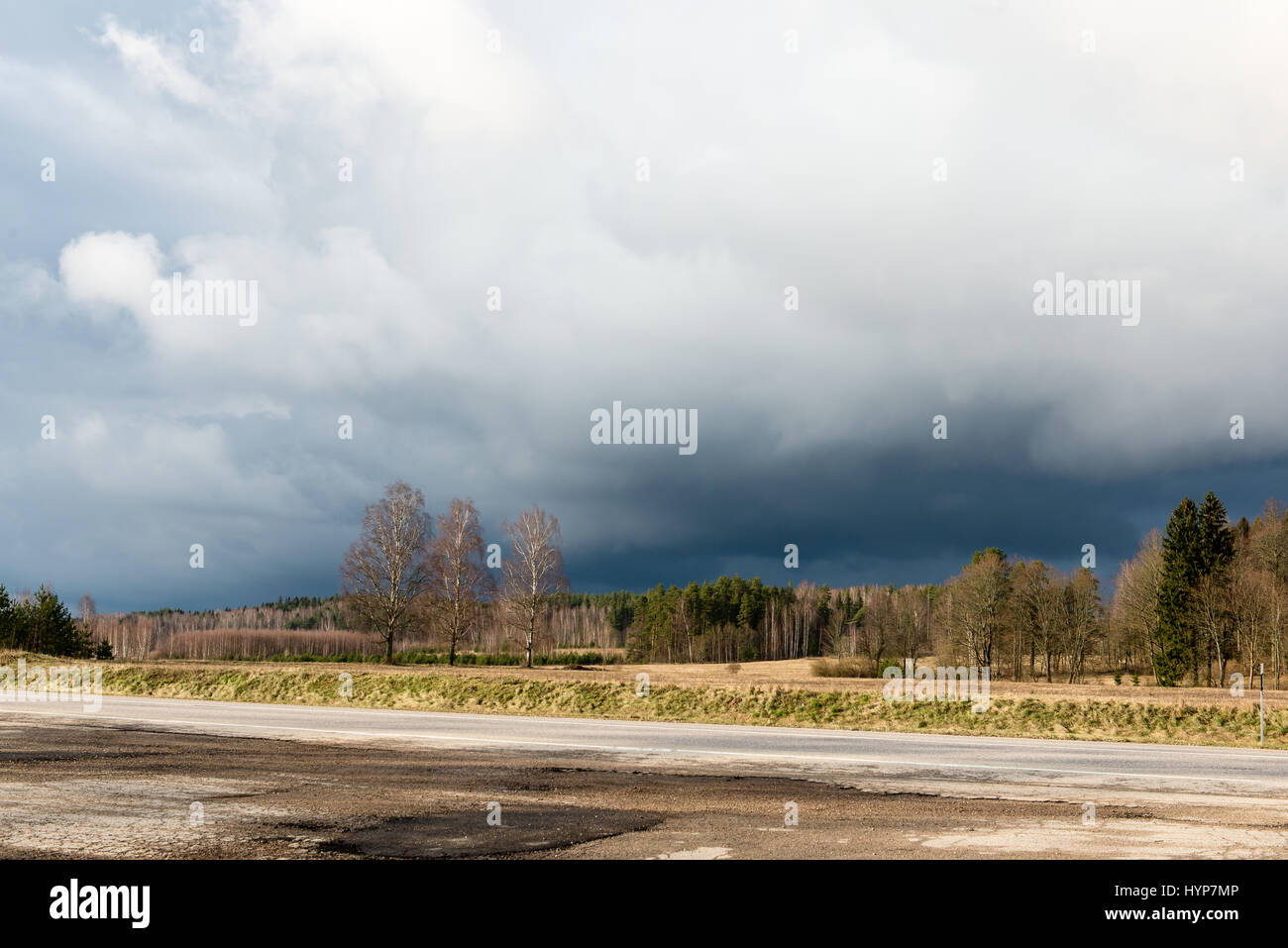countryside fields in early spring with clouds and farmland Stock Photo ...