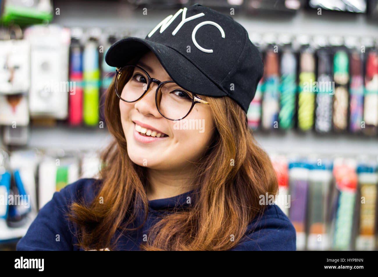 Chinese female shop assistant hi-res stock photography and images - Alamy