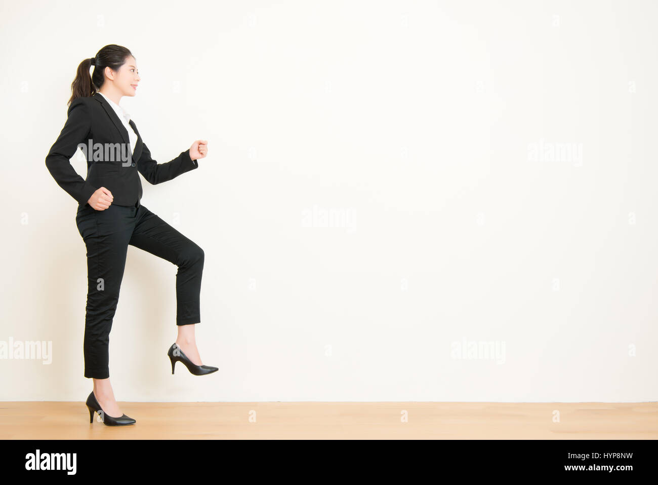 Young businesswoman walking up on steps of the career ladder, Business ...