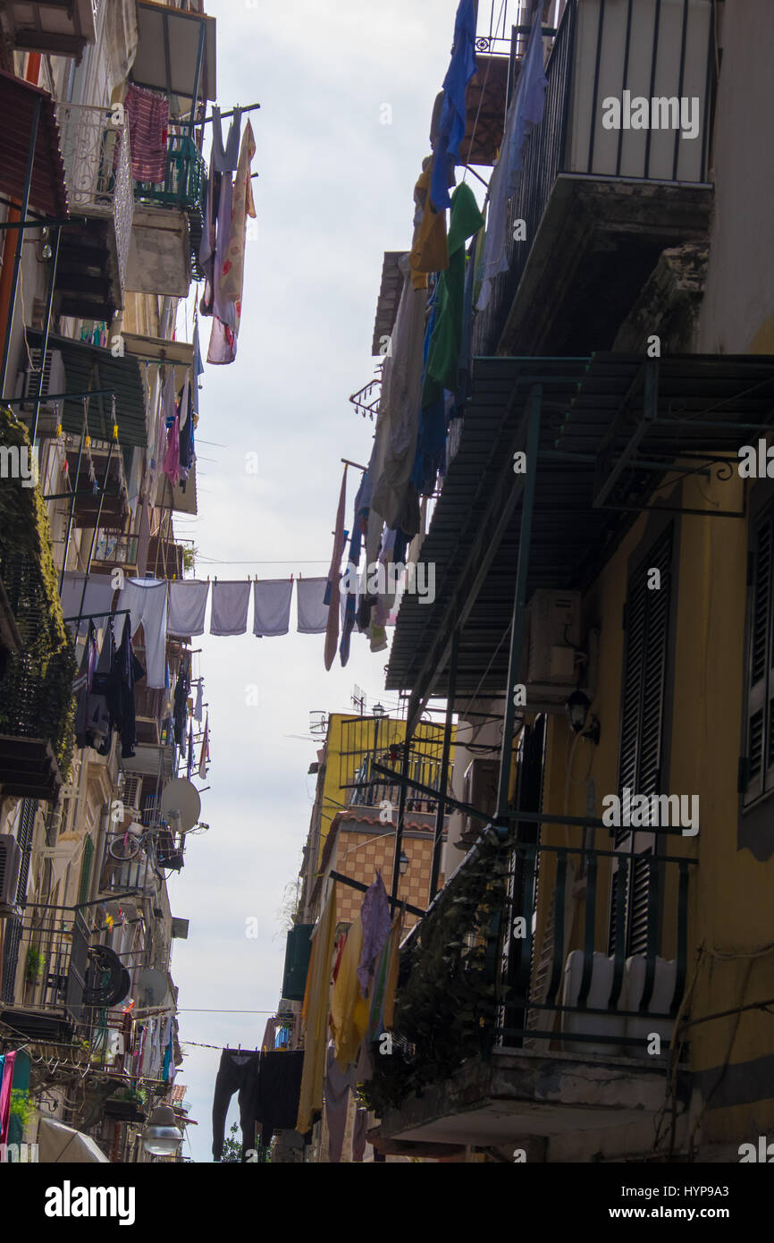 Narrow alley with hanging clothes, Naples, Italy Stock Photo - Alamy