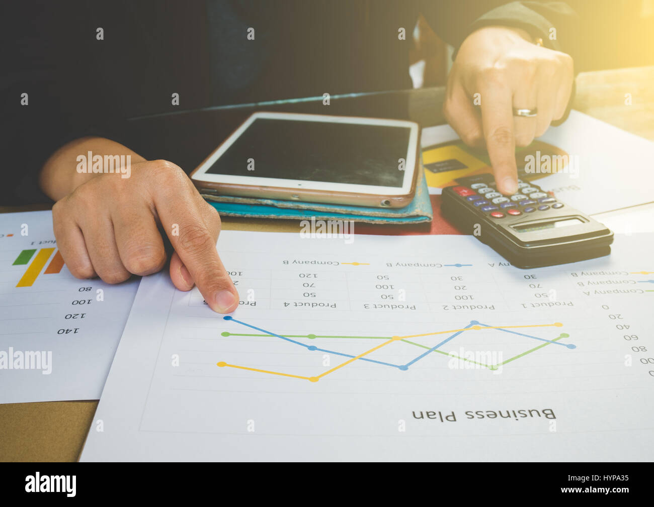 The hand is pointing at the Business summary or Business plan report ...