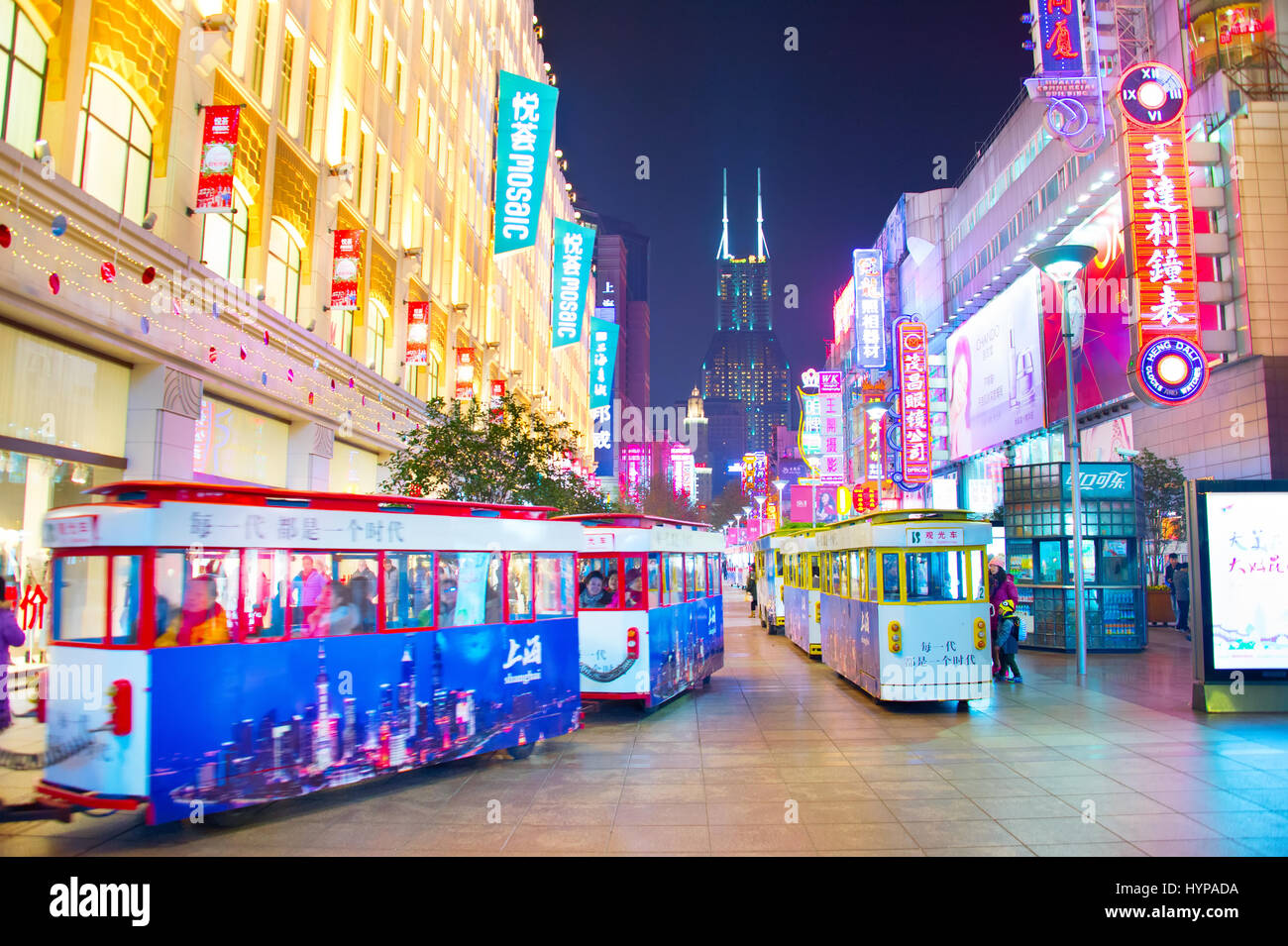 SHANGHAI, CHINA - DEC 28, 2016: Tourists trams on Nanjiing road in ...