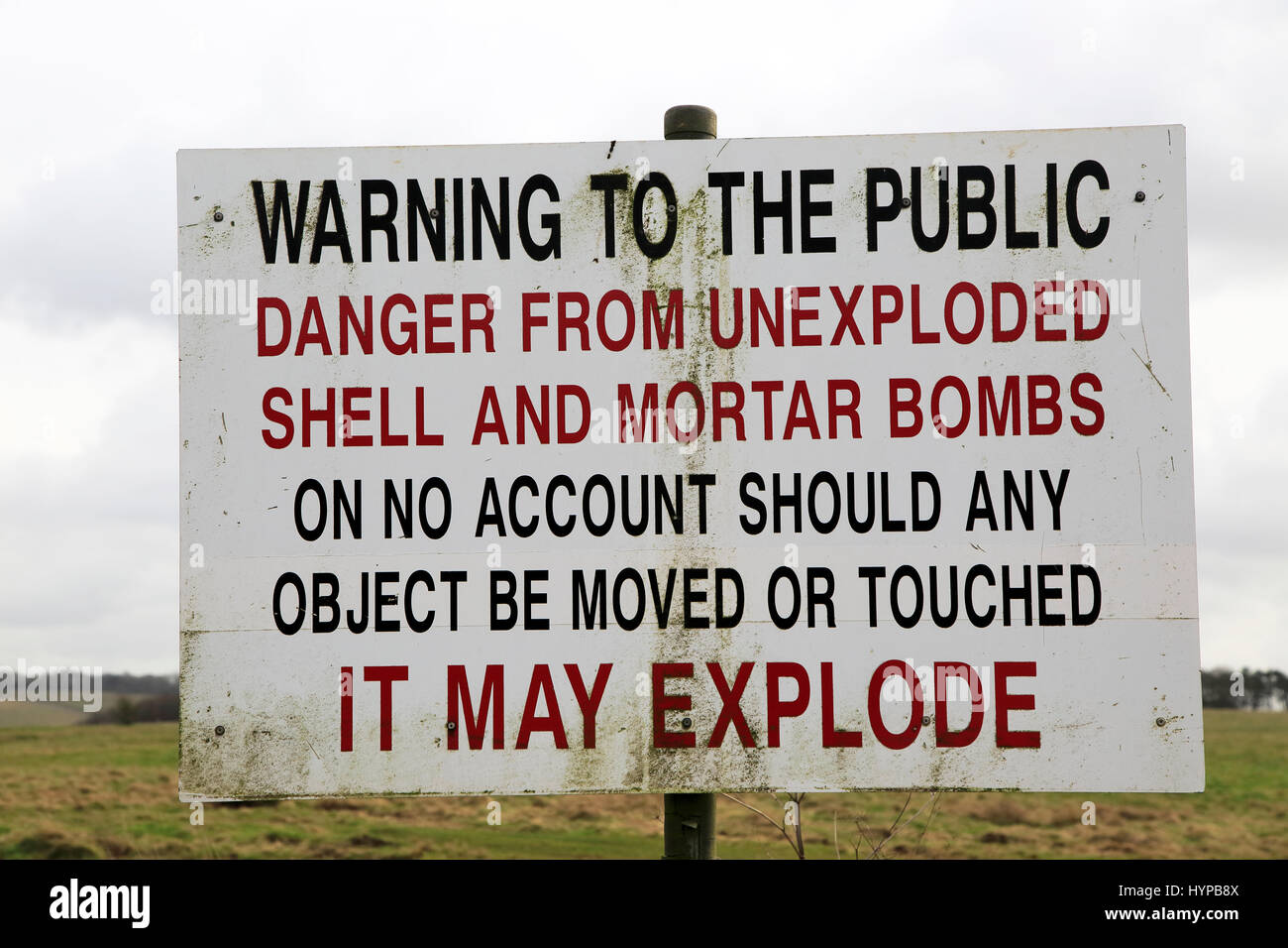 Ministry of Defence warning sign about unexploded shells and mortar ...
