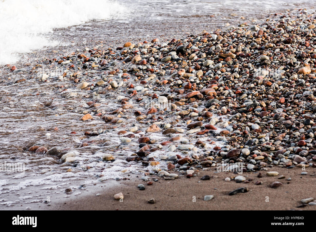 small pebble rock background texture at the beach Stock Photo - Alamy