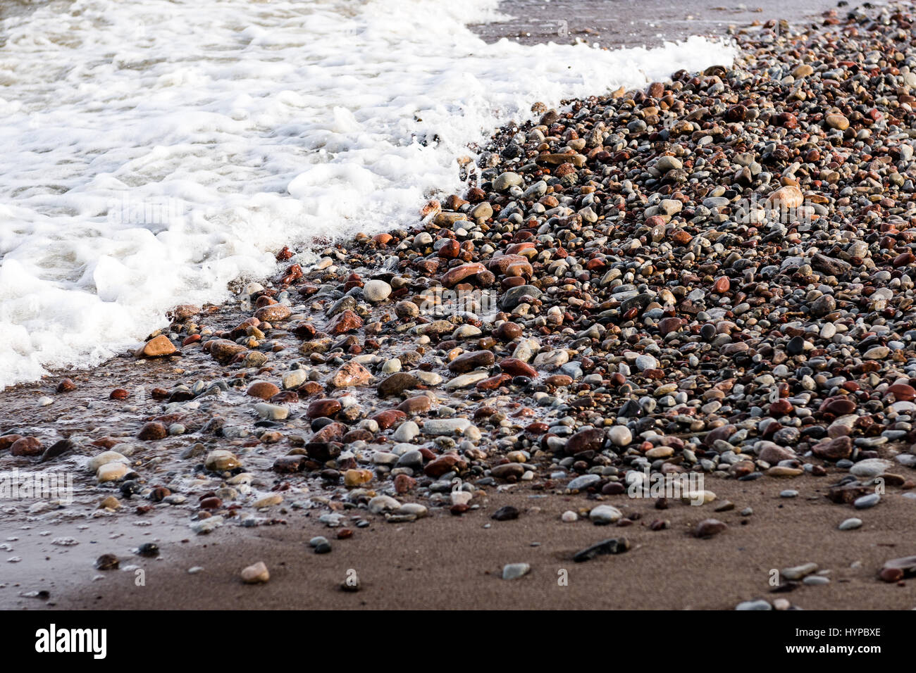 small pebble rock background texture at the beach Stock Photo - Alamy
