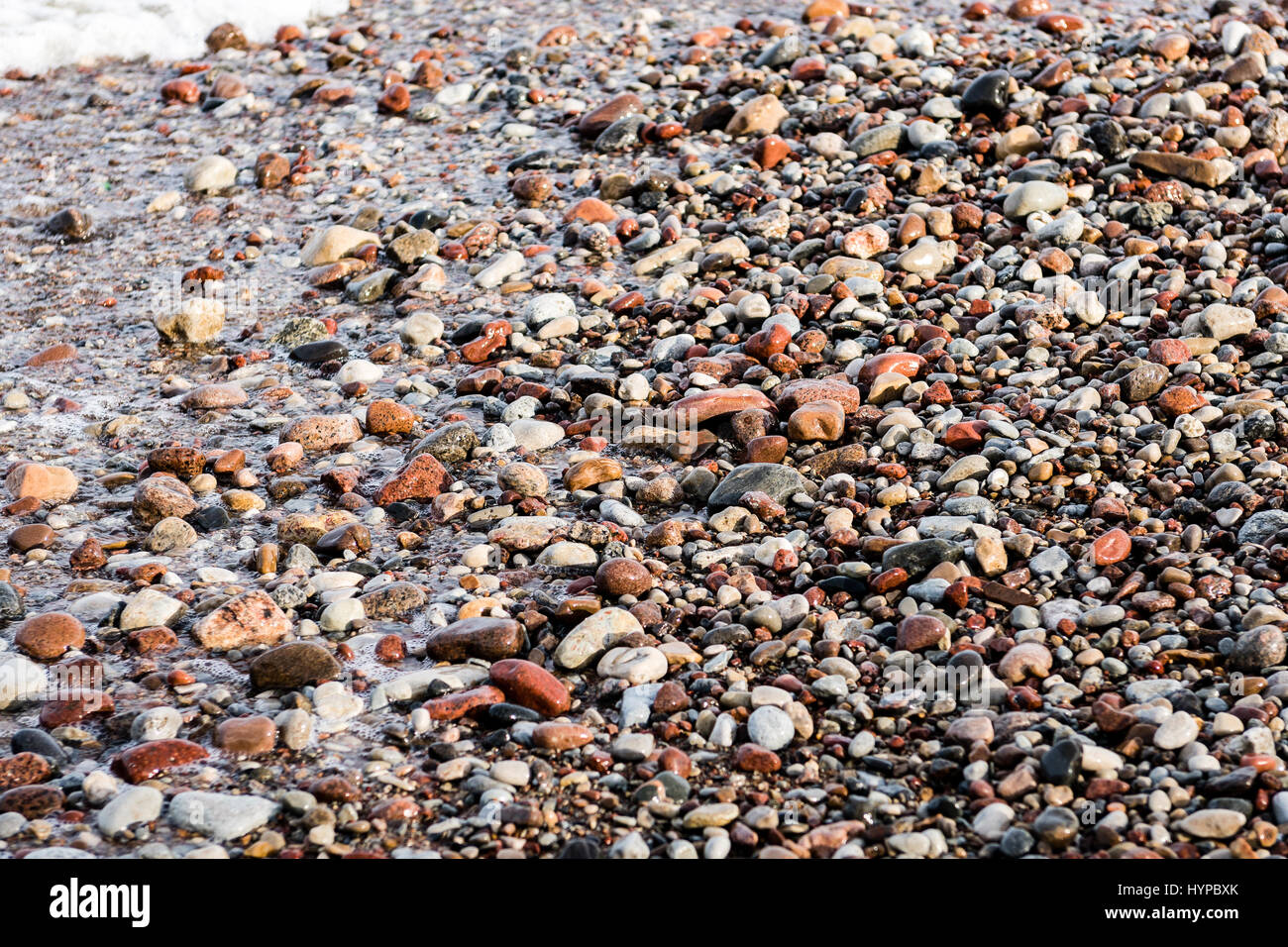 small pebble rock background texture at the beach Stock Photo - Alamy