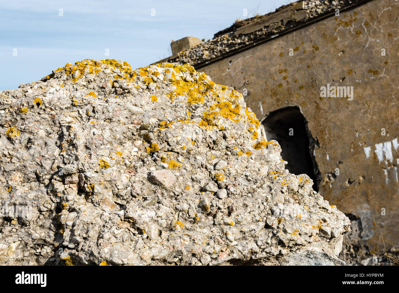 old war fort ruins on the beach with high waves in sunset. Liepaja ...