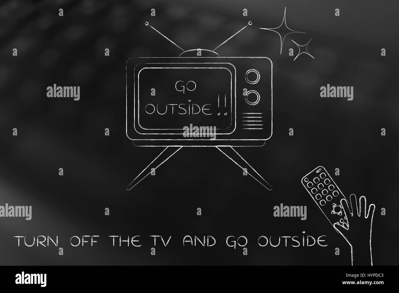 television screen with message Go Outside and hand holding remote ...