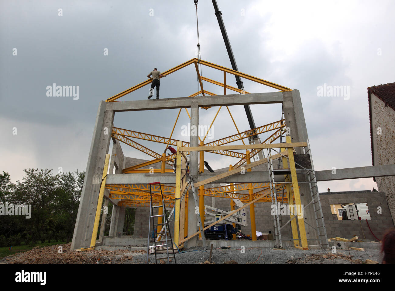 France,House building, handling safety with a crane, construction of a ...
