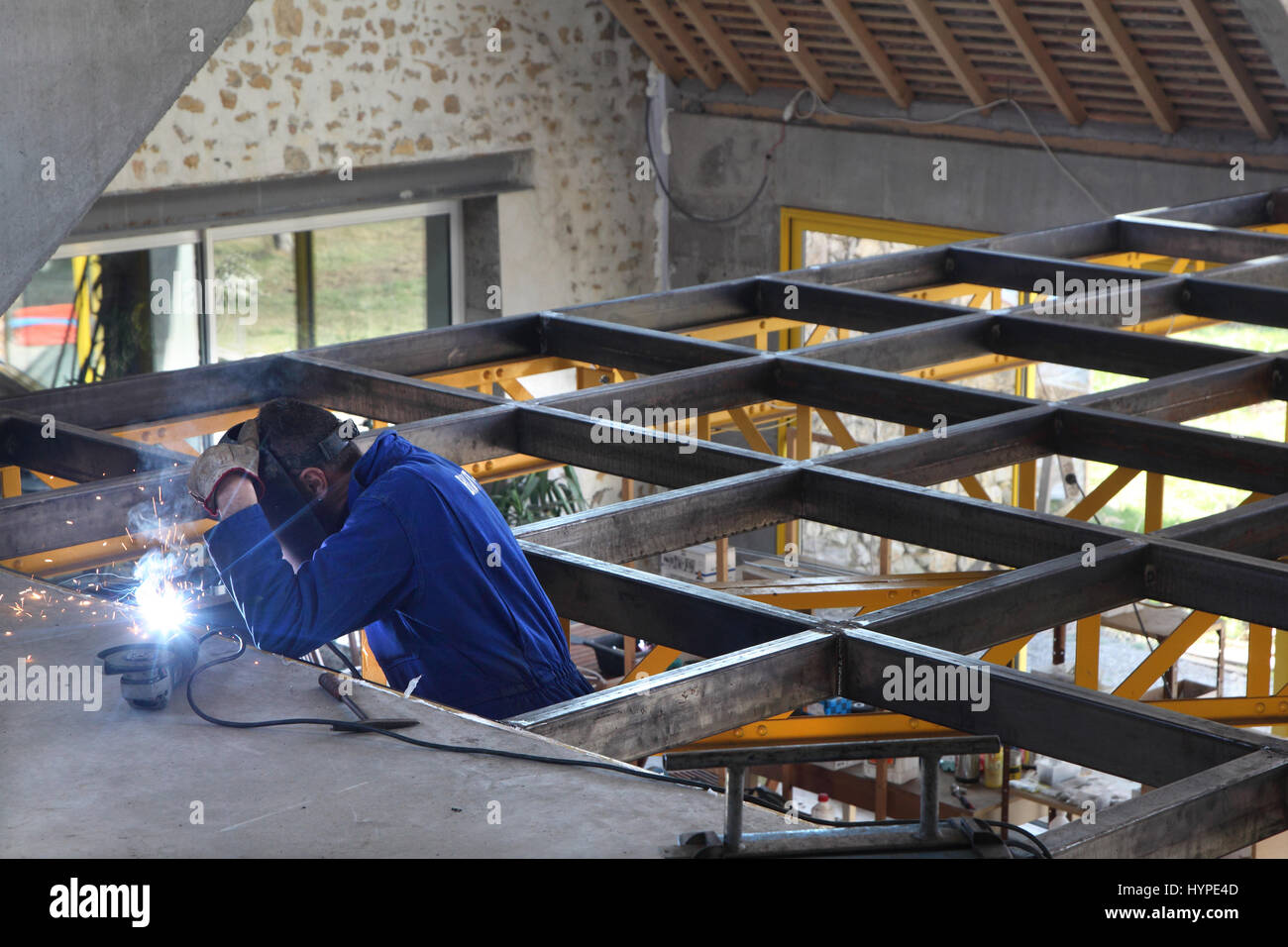 France,House building, assembly and metal-arc welding Stock Photo - Alamy