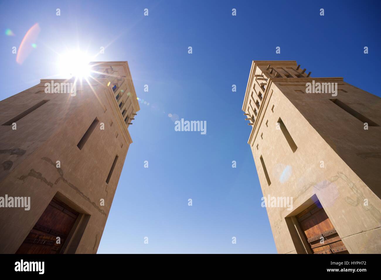 Wind towers in Dubai during the hot midday sun in the UAE Stock Photo ...