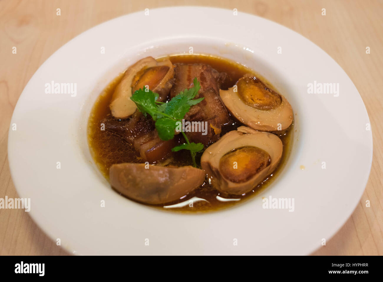 Thai Style Salted Eggs Stewed with Streaky Pork Stock Photo - Alamy