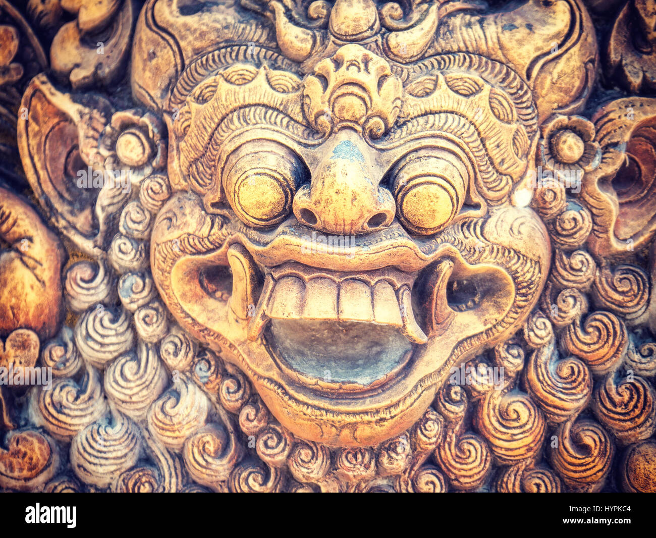 Stone sculpture on entrance door of Pura Padmasana Puja Mandala temple ...