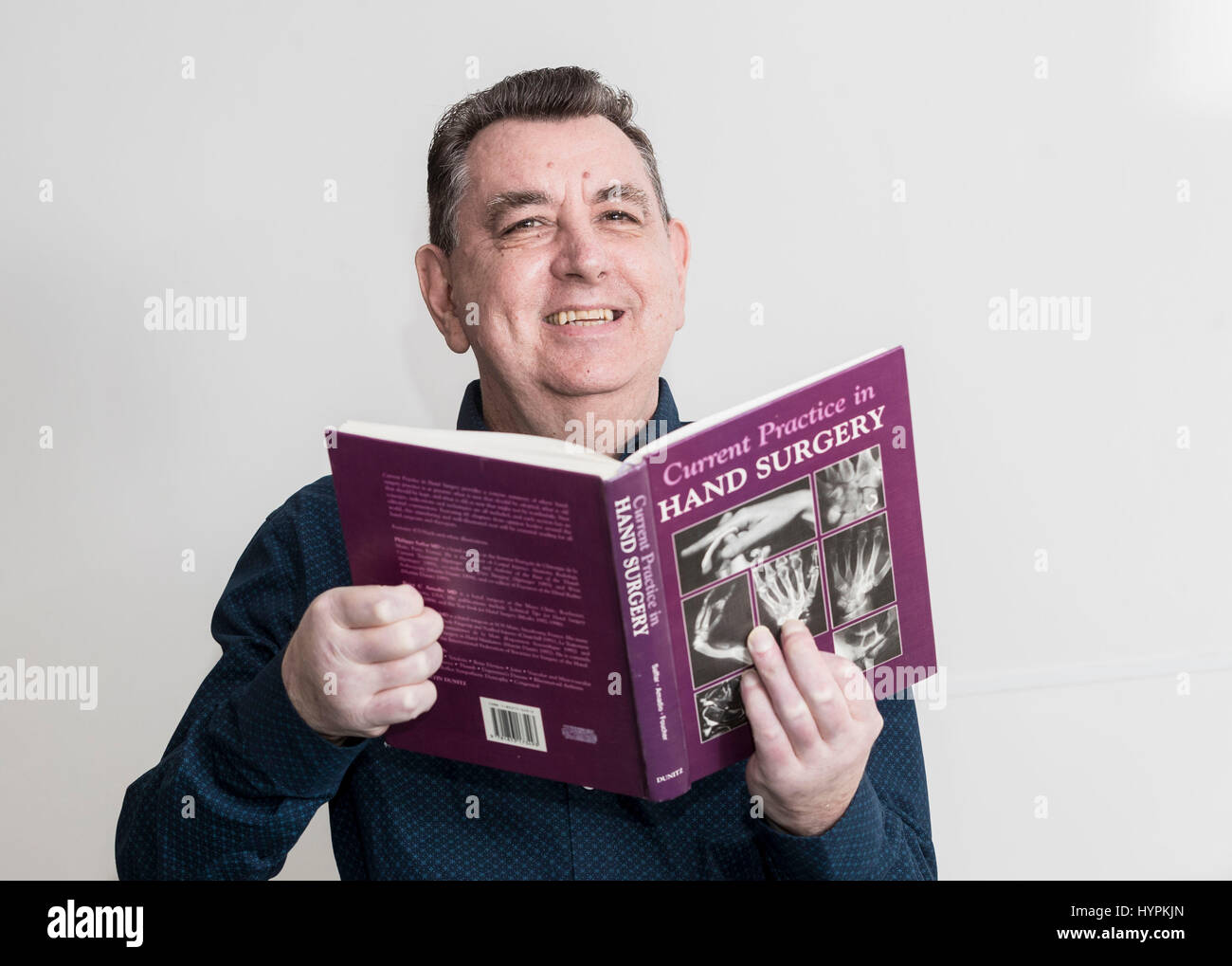 The UK's first double hand transplant patient Chris King demonstrates ...