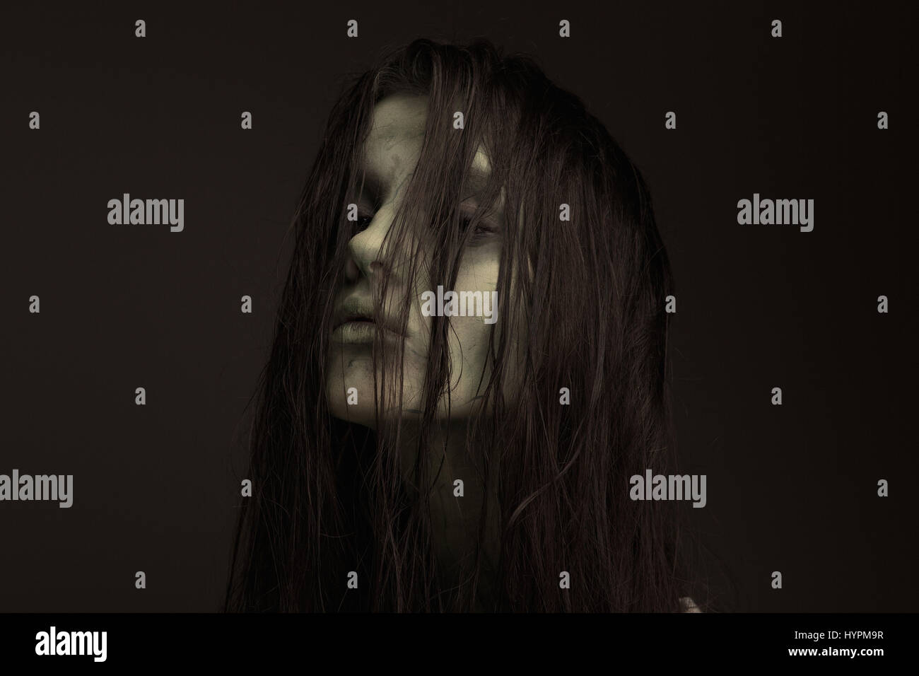 Close up portrait of a evil woman possessed by the devil. Zombie ...