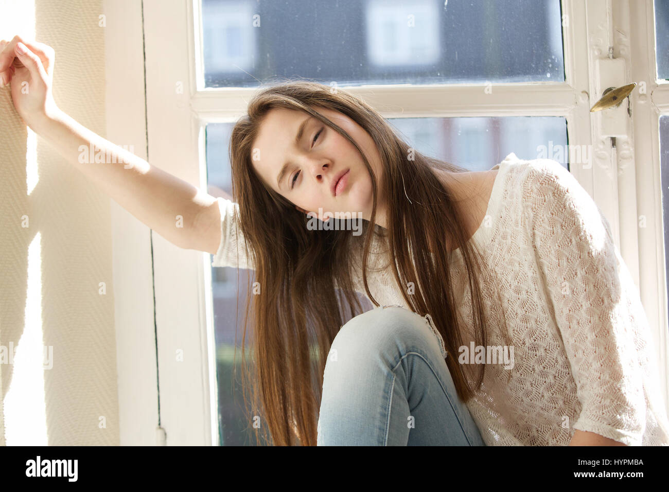 Posing by the window hi-res stock photography and images - Alamy