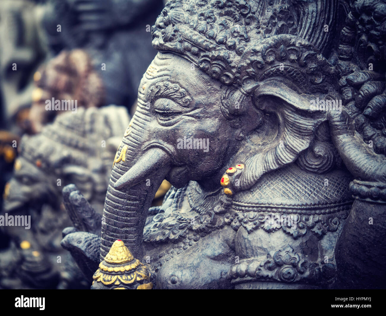 Ancient Balinese statue at the temple in Bali Indonesia Stock Photo - Alamy