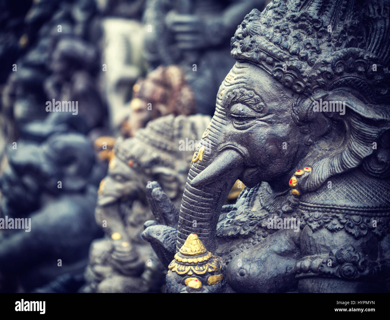 Ancient Balinese statue at the temple in Bali Indonesia Stock Photo - Alamy