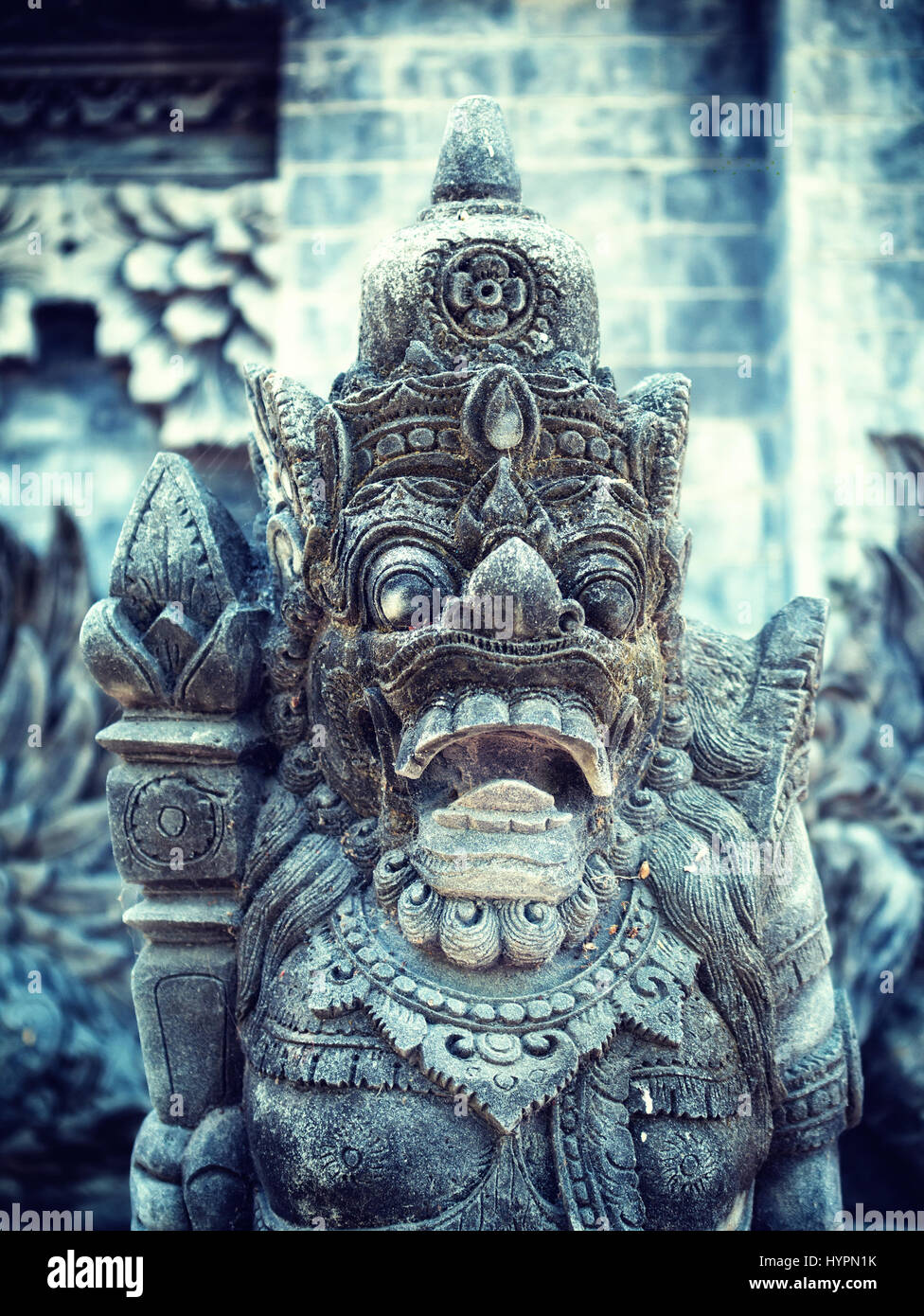Ancient Balinese statue at the temple in Bali Indonesia Stock Photo - Alamy