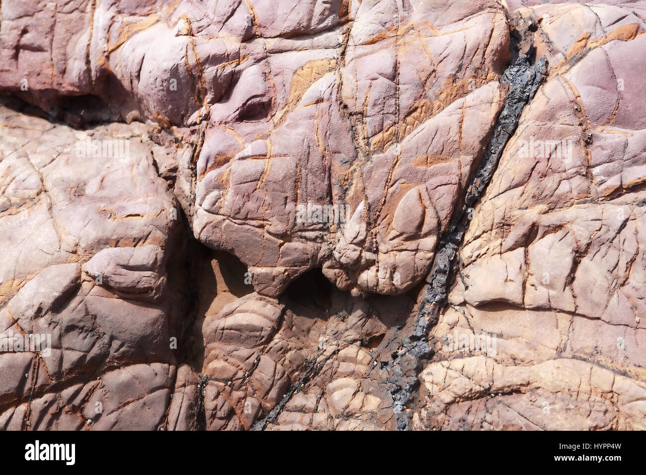 Nice red volcanic stone structure as background Stock Photo - Alamy