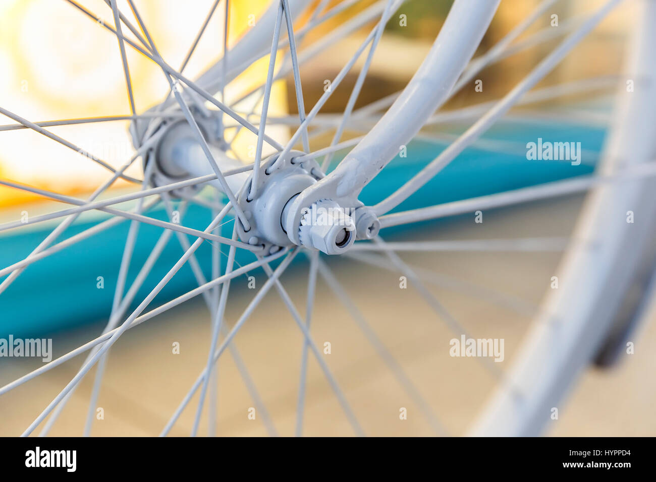 Bicycle painted white standing on the street Stock Photo - Alamy