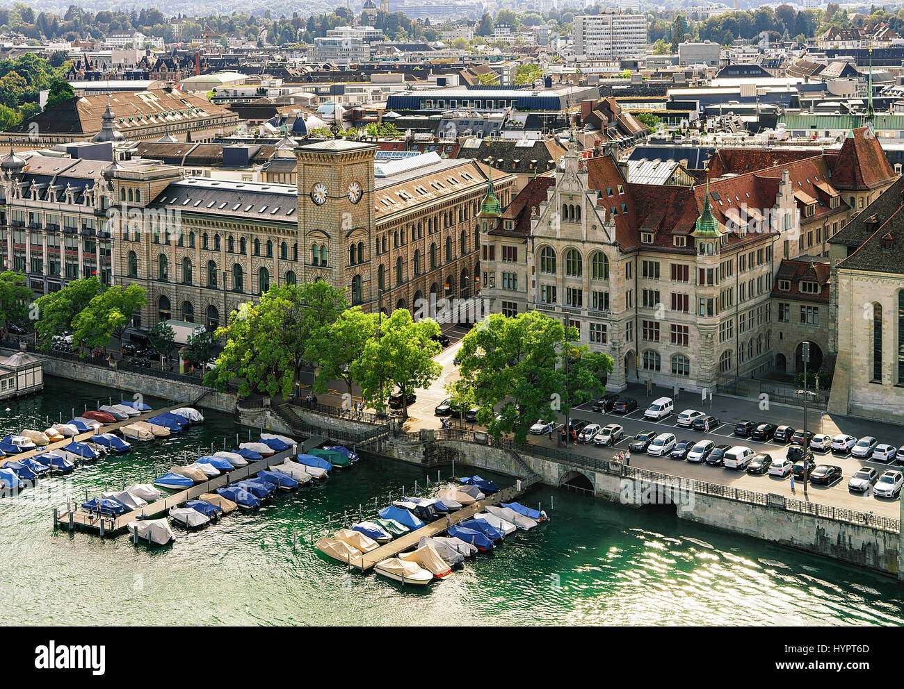 Boats at Post office and Stadthaus at Limmat River in Zurich old town ...