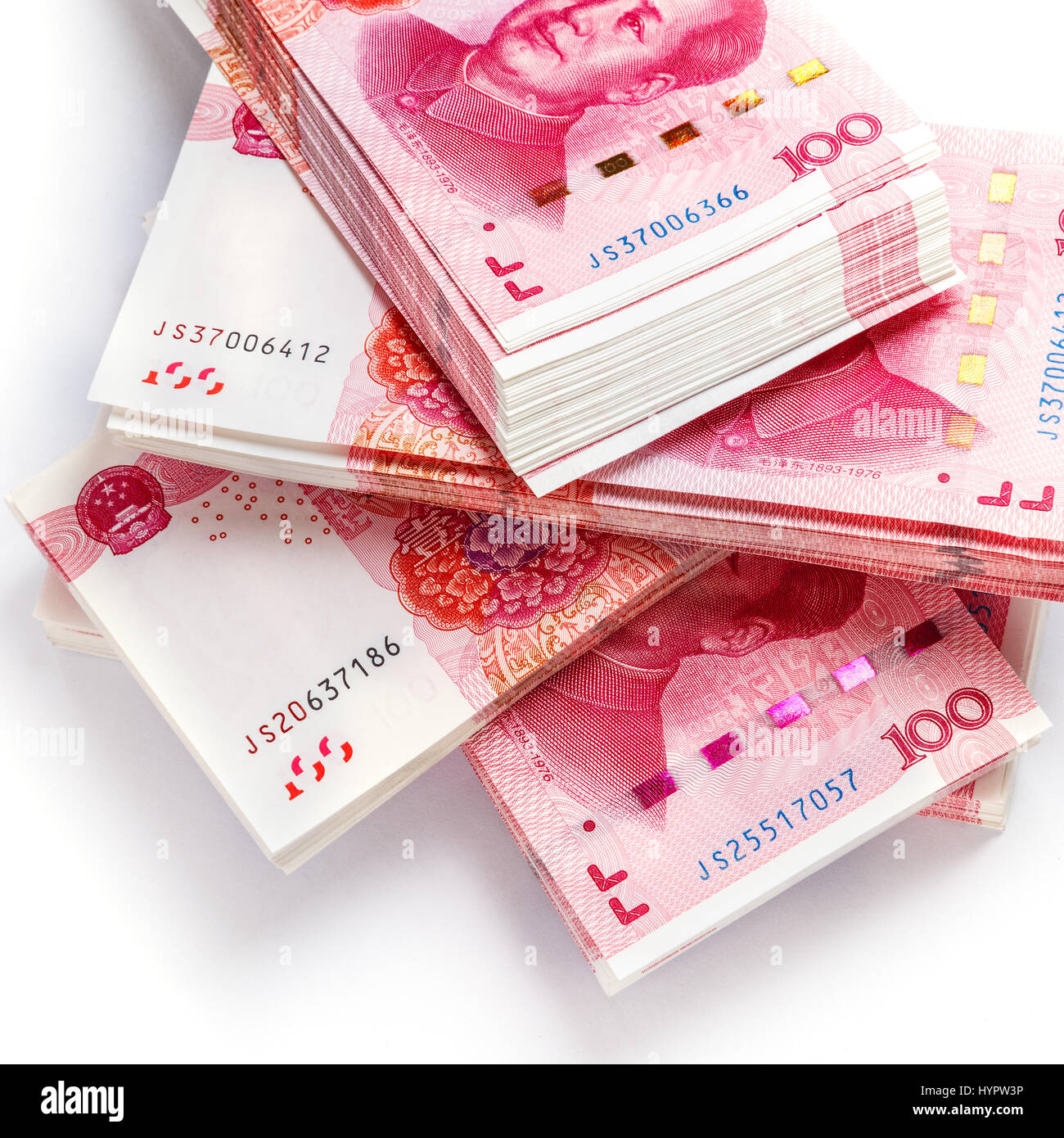 Stacks of one hundred china banknotes close-up isolated on white ...