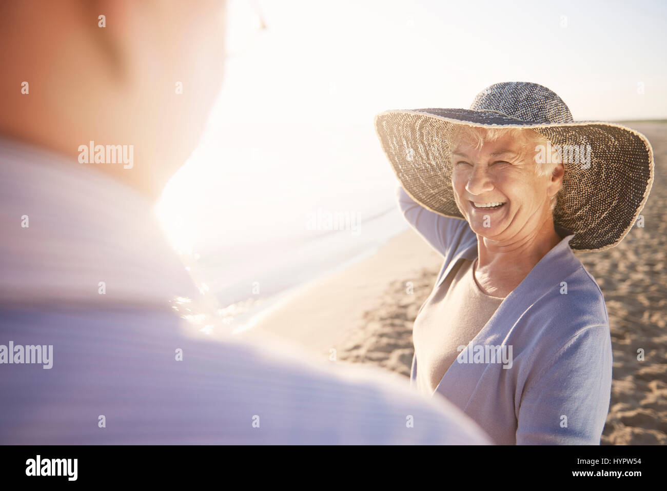 Protection from strong sun on the beach Stock Photo - Alamy