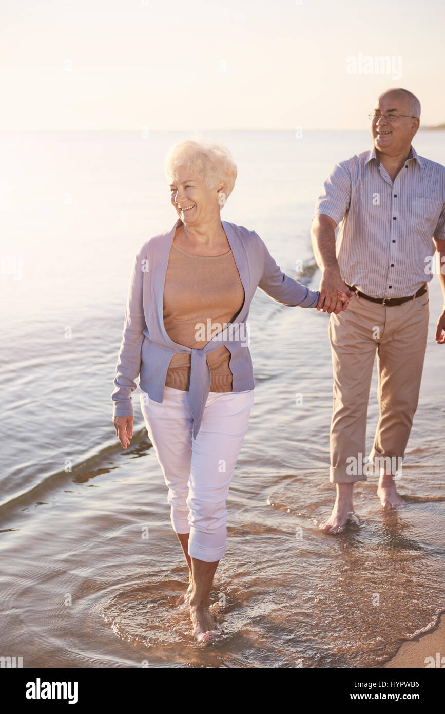 Walking in the cold sea water Stock Photo - Alamy