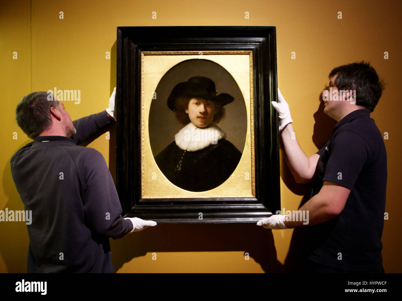 Art technicians (from left) Andy Cavanagh and Paul McCall help to move ...