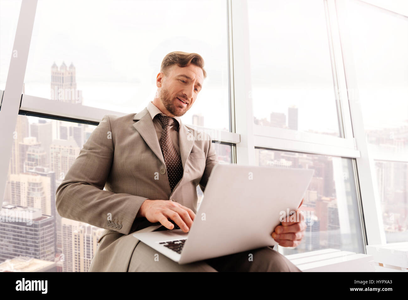 Successful businessman working in the office Stock Photo - Alamy