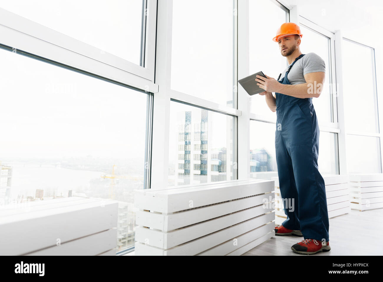 Professioan engineer standing in the office Stock Photo - Alamy