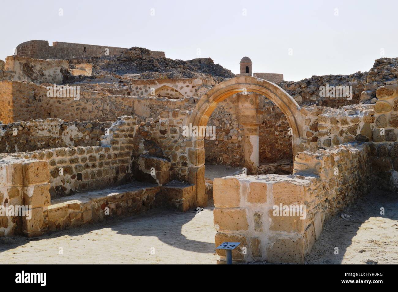 A remarkable feature arch of the Bahrain Fort at Al Qalah, Bahrain, in ...