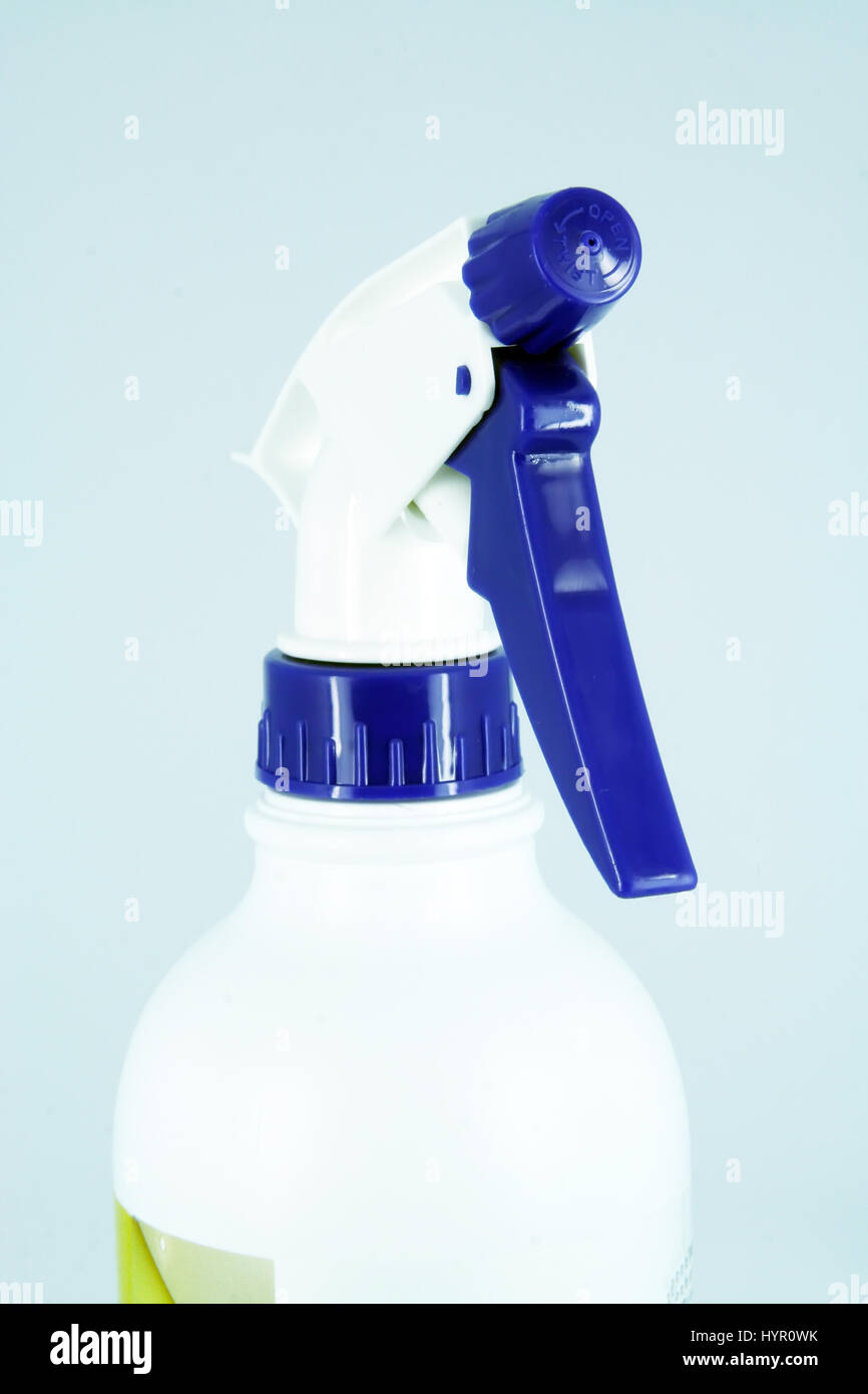 Watering sprayer. Blue and white plastic bottle sprayer Stock Photo - Alamy